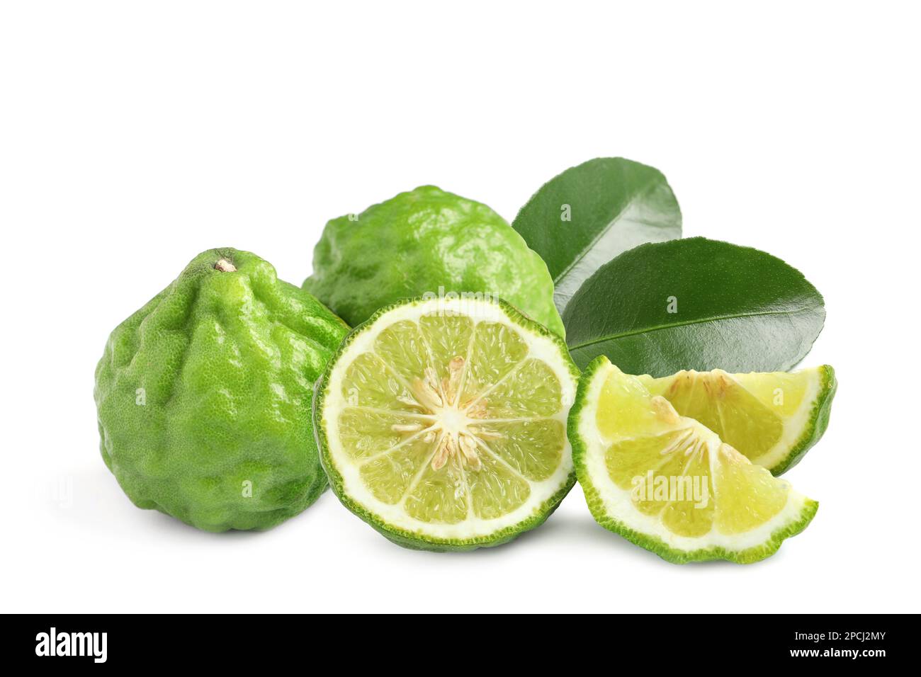 Fresh ripe bergamot fruits and green leaves on white background Stock ...