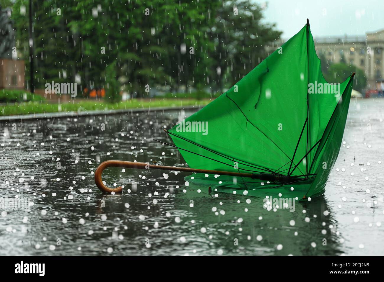 Wind damaged broken umbrella hi-res stock photography and images - Alamy