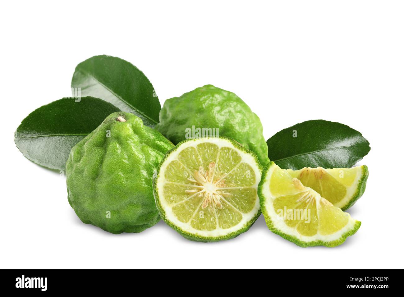 Fresh ripe bergamot fruits and green leaves on white background Stock ...