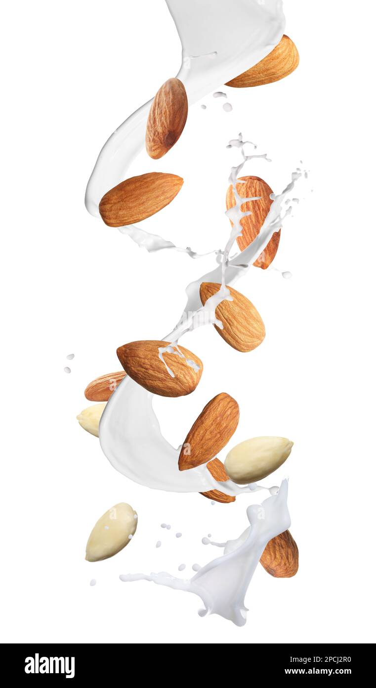 Delicious almond milk and nuts on white background Stock Photo - Alamy