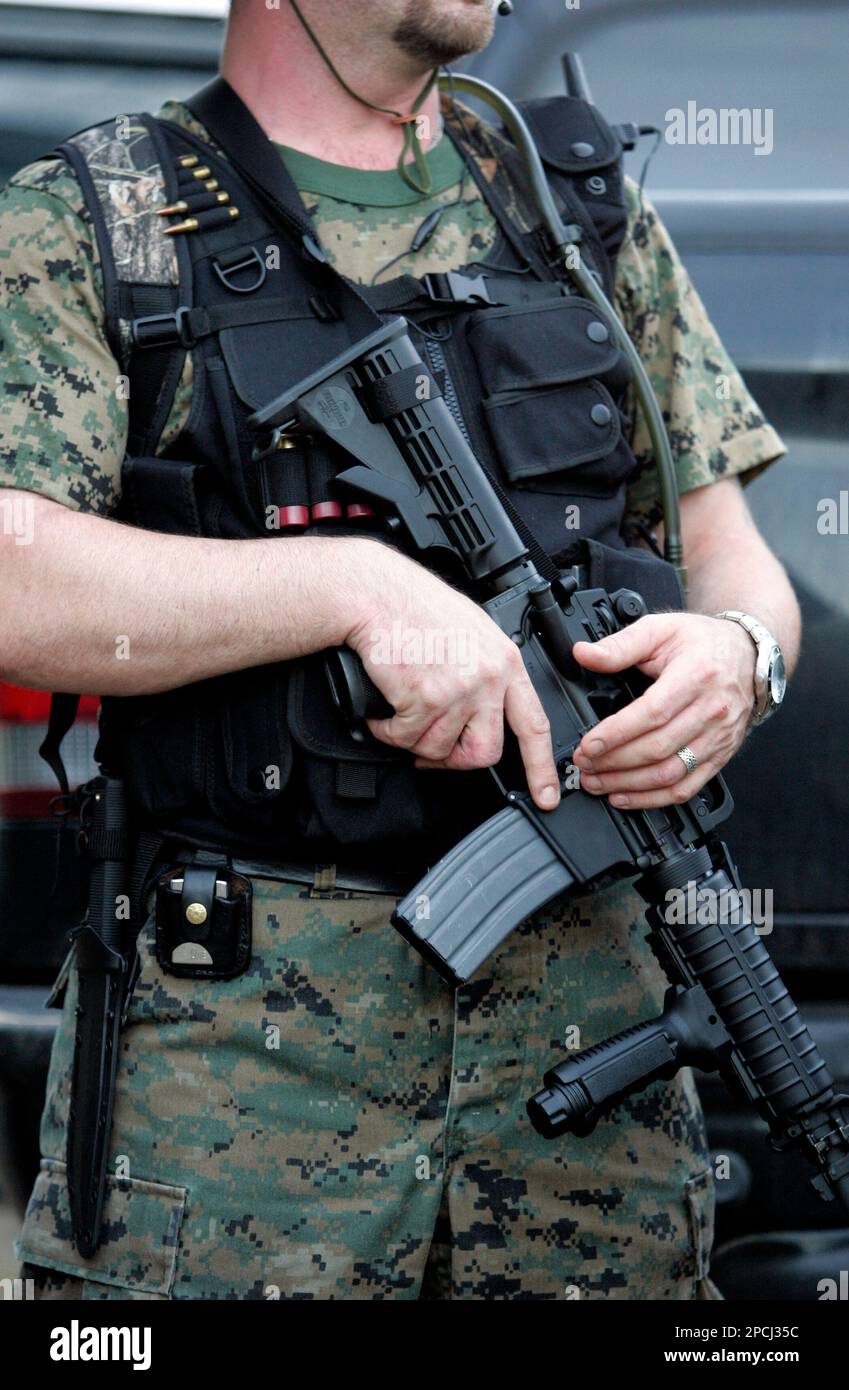 Scott Bulkley, with the Texas Militia, stages on a ranch near Indio ...