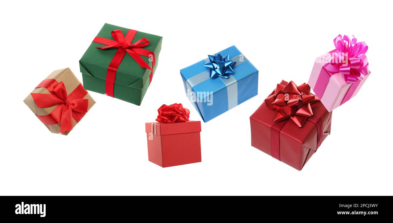 Beautifully wrapped gift boxes flying on white background Stock Photo ...