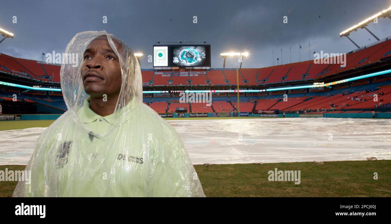 Dolphin Stadium security worker Gregory Wright guards the field during ...