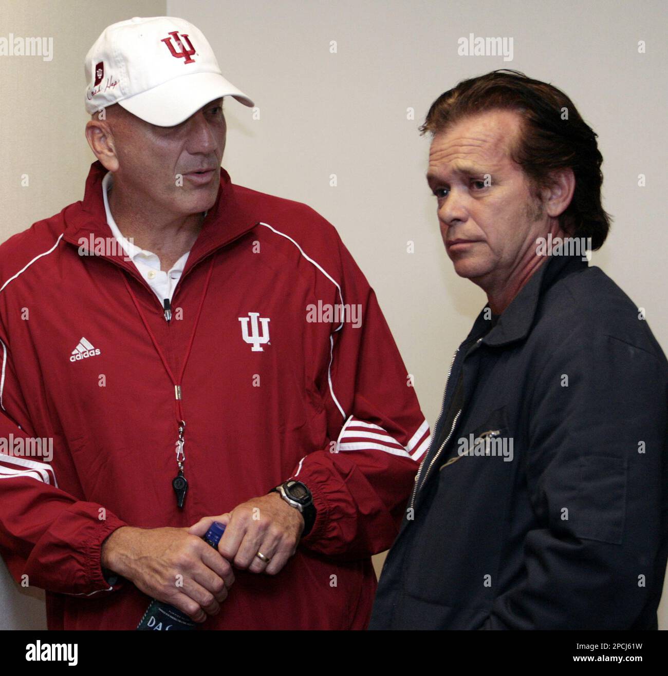 Indiana football coach Terry Hoeppner, left, talks with entertainer ...