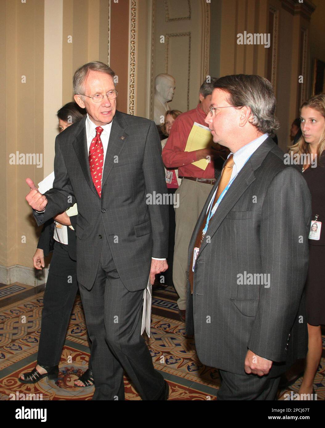Senate Minority Leader Harry Reid of Nev. heads to the Senate floor on ...
