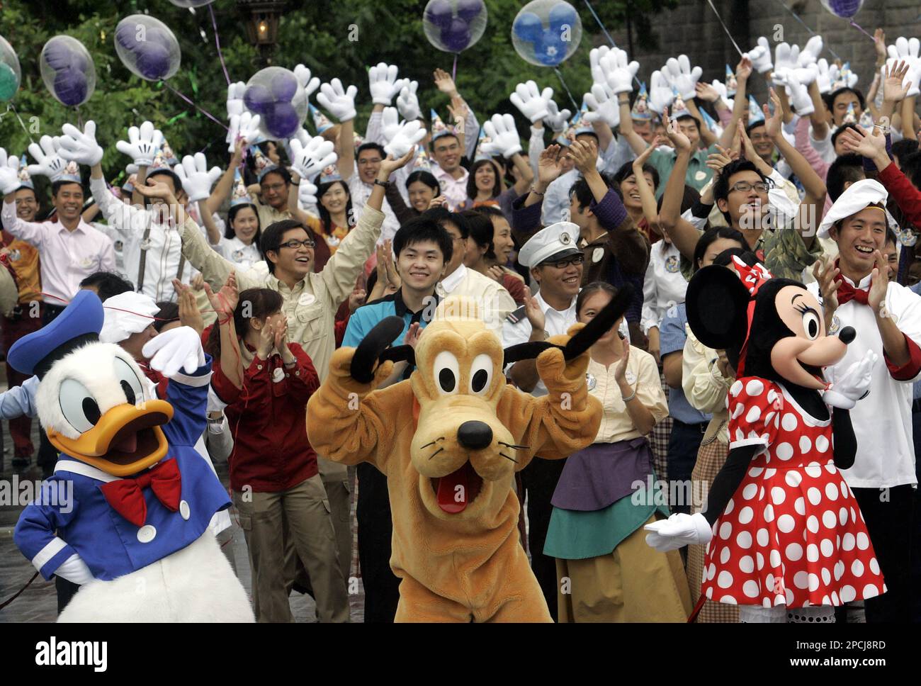 Disney's characters Minnie Mouse, Goofy, Donald Duck and staffs ...
