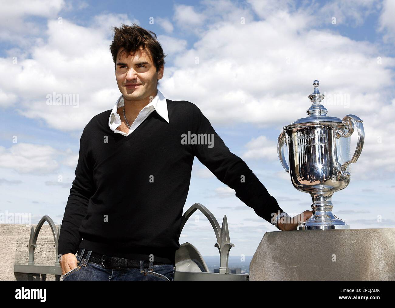 US Open men's singles champion Roger Federer poses for a picture with ...