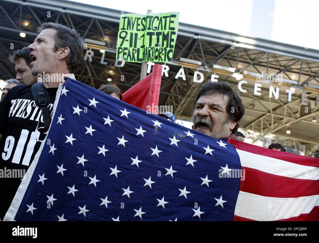 Anti-Bush protestors shout slogans as the names of victims are read at ...