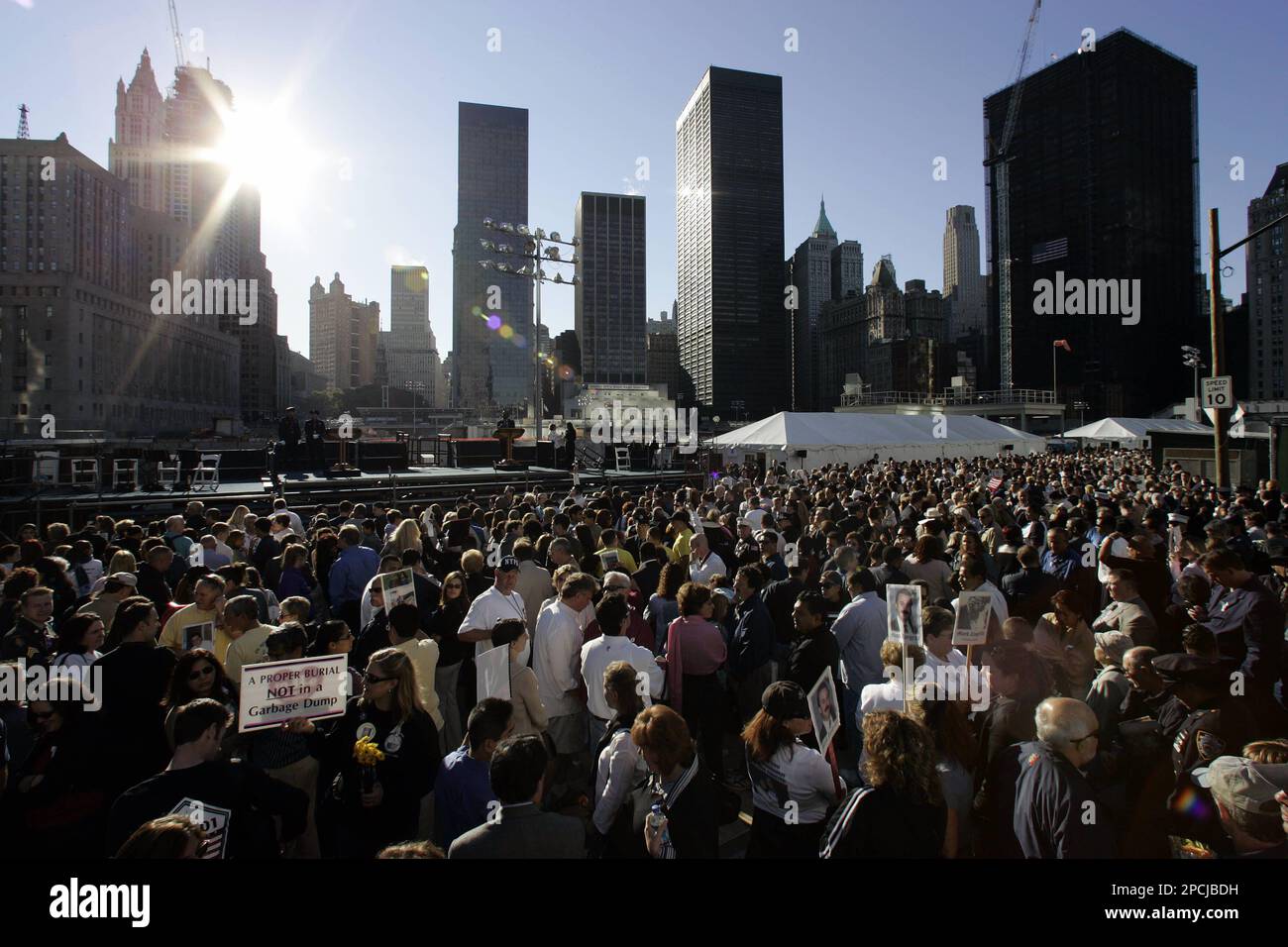 The sun rises over thousands of mourners during a ceremony Monday, Sept ...