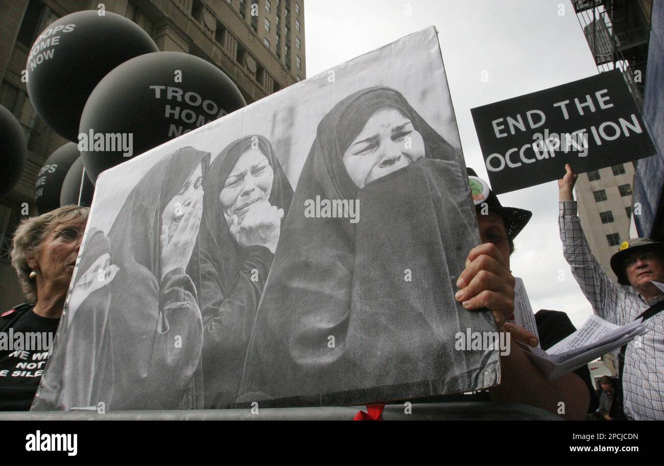 Carol Husten, partially obscured at left, 74, of the Brooklyn borough ...