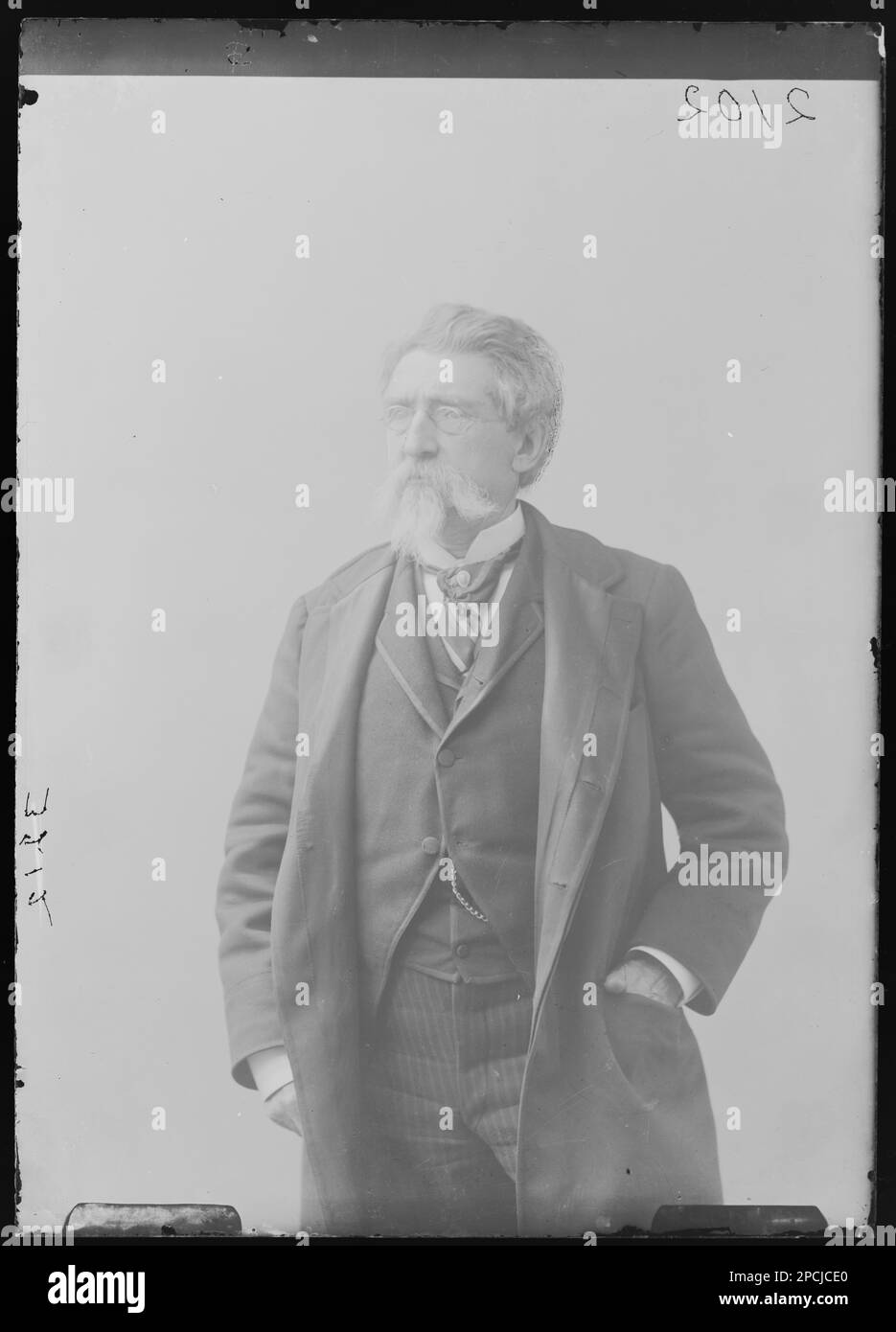 Photographer Mathew B. Brady, three-quarter length portrait, facing ...
