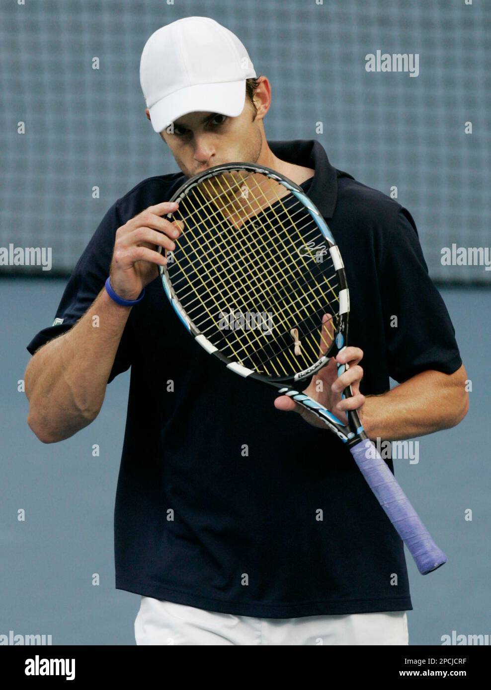 Andy Roddick, of the United States, kisses his racquet during the men's ...