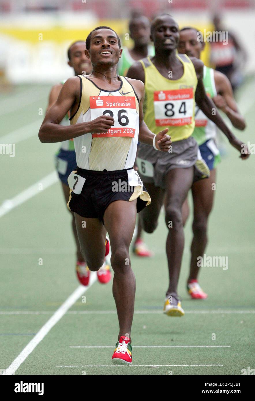 Ethiopia's Kenenisa Bekele smiles as he crosses the finish line to win ...
