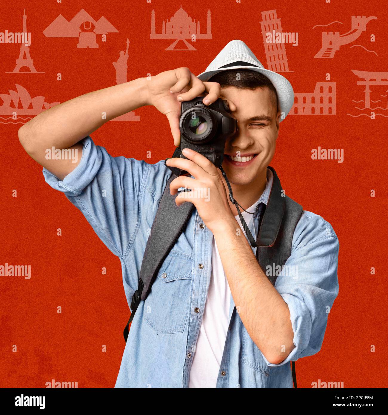Happy millennial european man tourist in hat makes photo on camera on ...