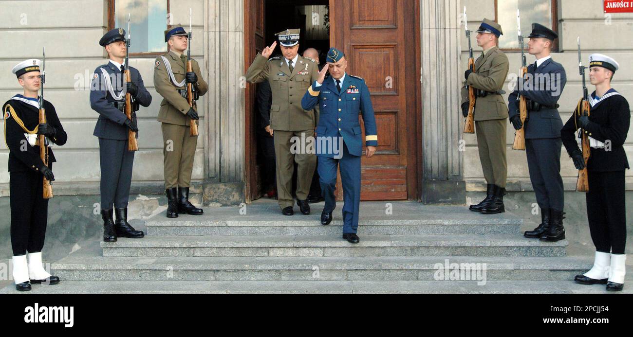 Canadian Gen. Ray Henault, Chairman of NATO Military Committee, center ...