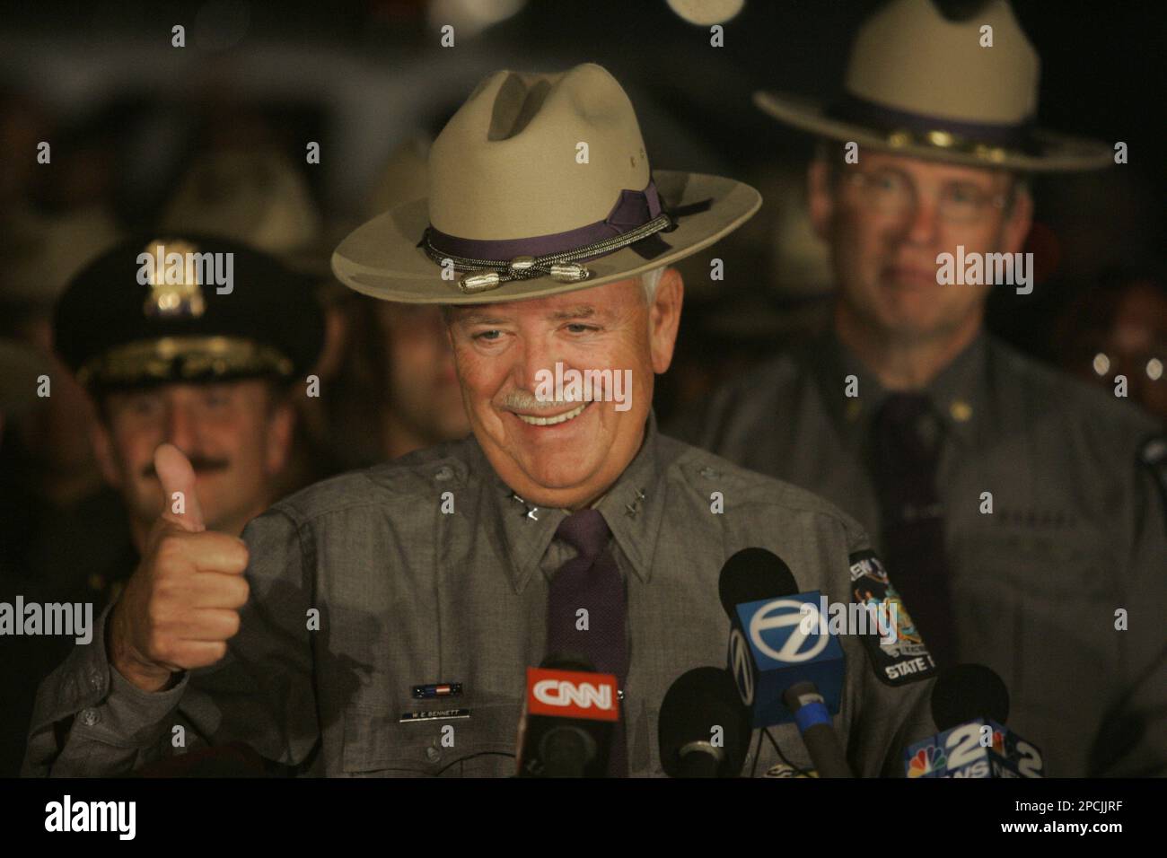 New York State Police Superintendent Wayne Bennett gives the thumbs up ...