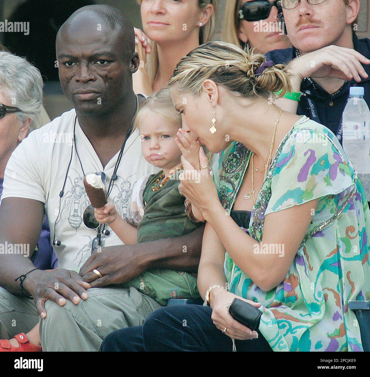 Musican Seal, left, and his wife Heidi Klum sit with Klum's daughter ...