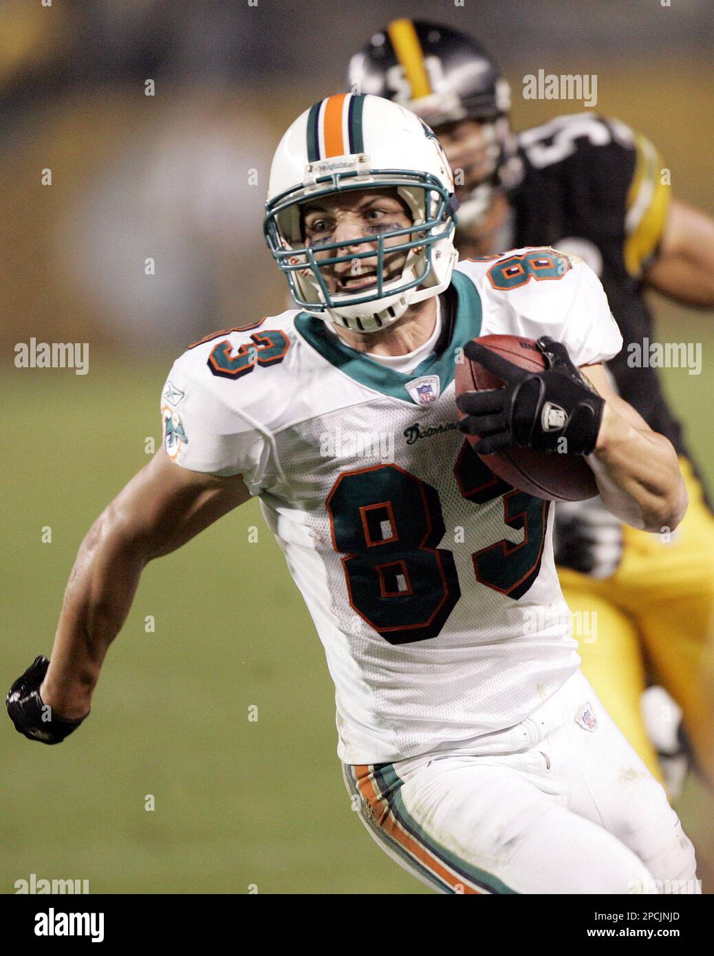 Miami Dolphins wide receiver Wes Welker (83) runs past Pittsburgh ...