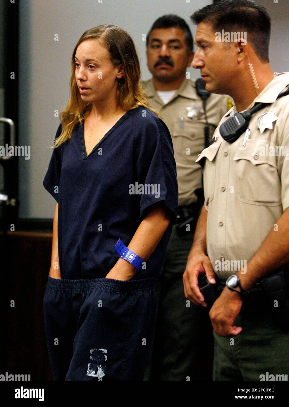 Lisa Maree Gaut, left, is brought into court by San Diego County ...