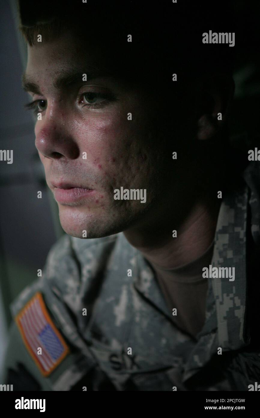 Spc. Christopher Six, 20, is seen during an interview with the ...