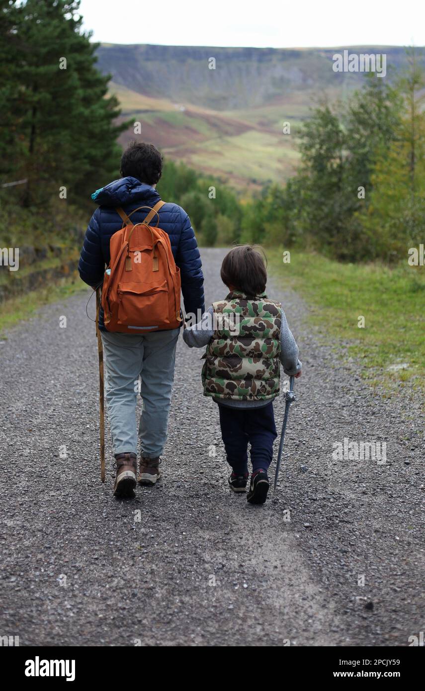 Mother and child hiking outdoors Stock Photo - Alamy