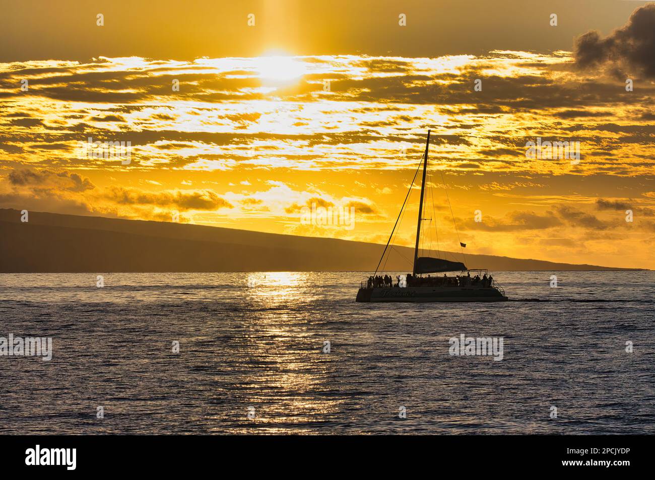 End of a whale watch on Maui at sunset Stock Photo - Alamy