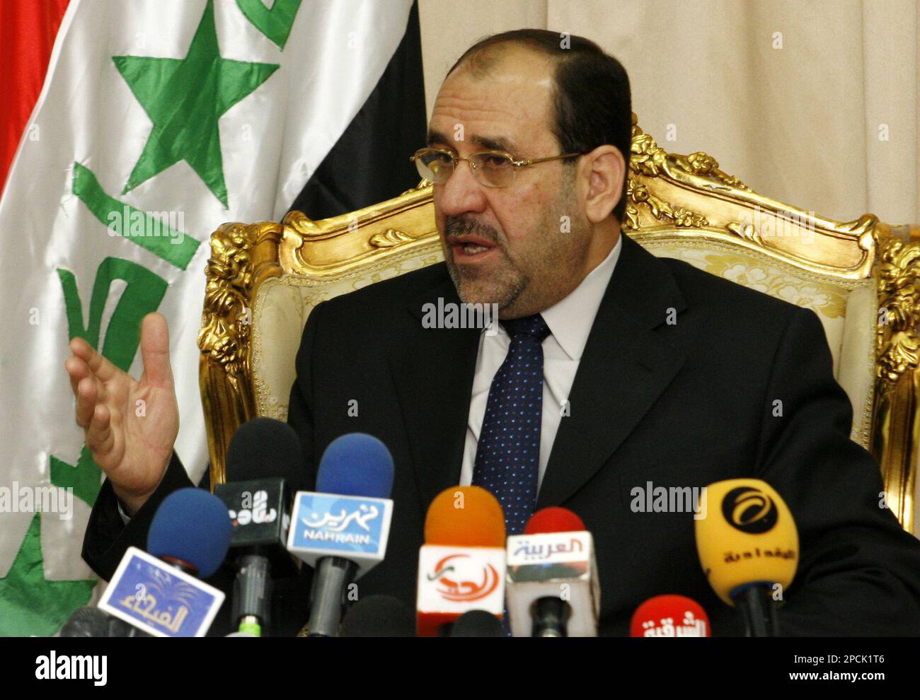 Iraqi Prime Minister Nouri al-Maliki speaks during a meeting with Iraqi ...