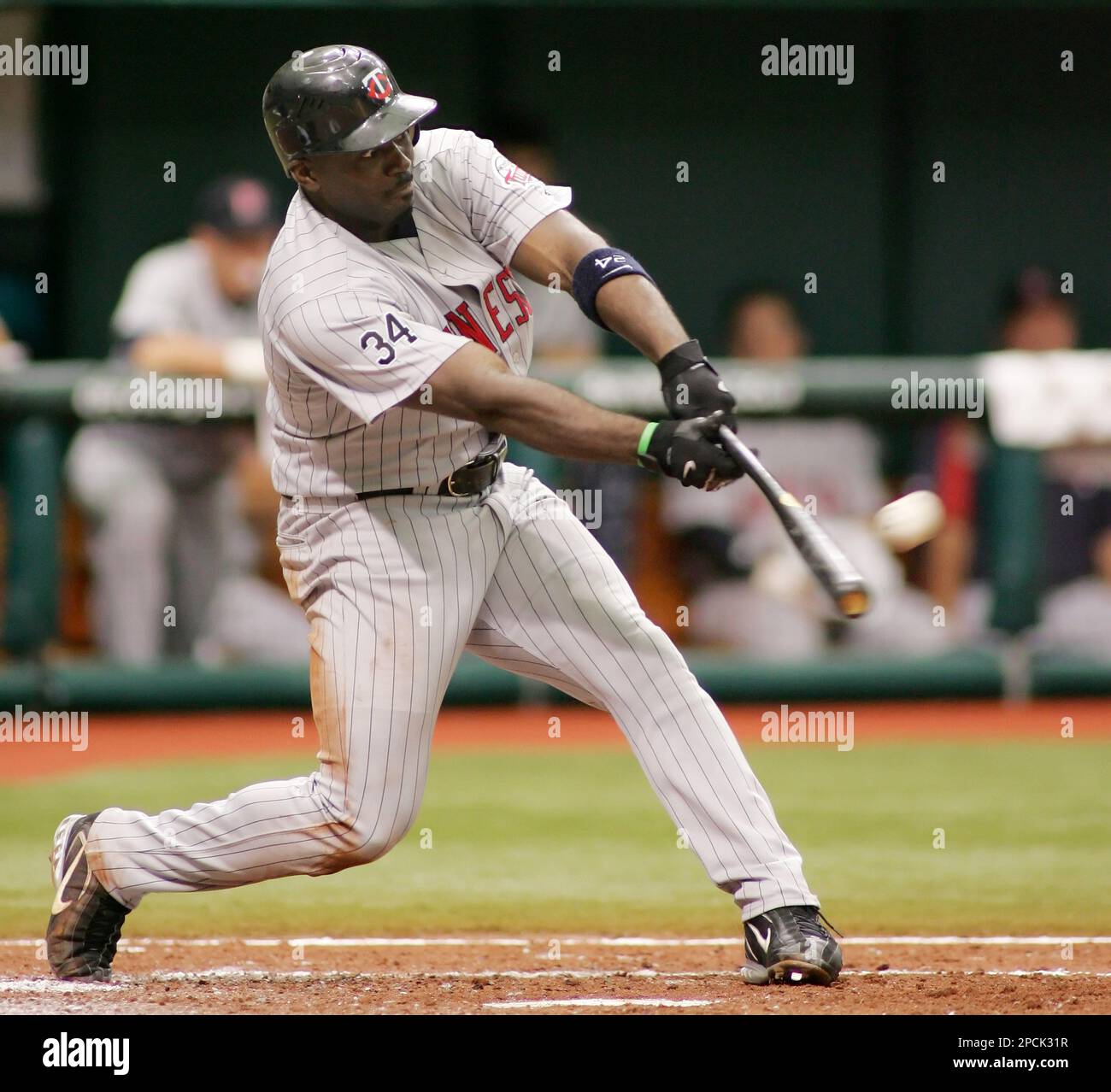 Minnesota Twins' Rondell White hits a seventh inning go-ahead two-run ...