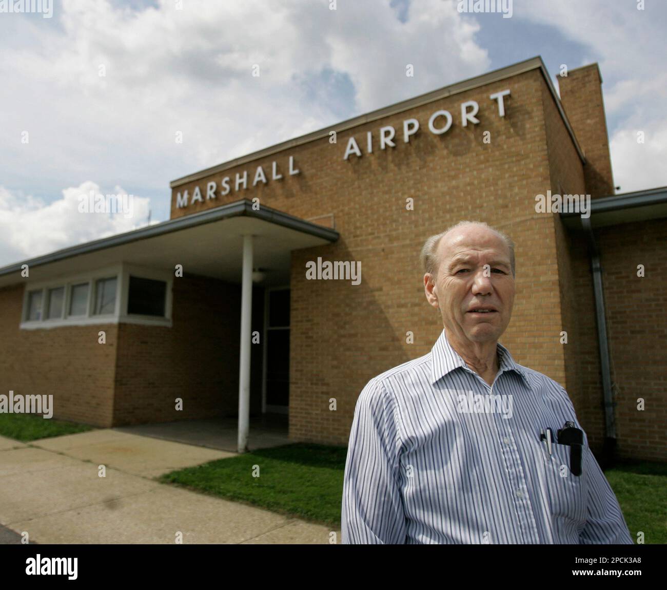 Dan Silverthorn stands on the tarmac at the Marshall, Mo., airport ...