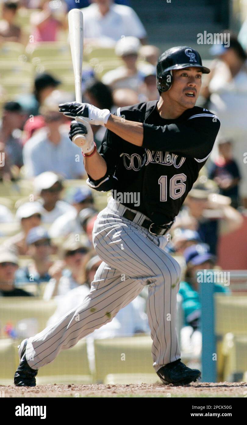 Colorado Rockies' Kazuo Matsui, of Japan, watches his two-run triple ...