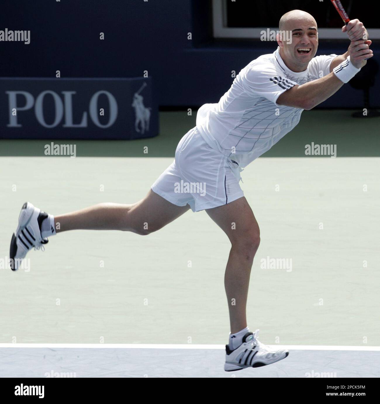 Andre Agassi makes a return to Benjamin Becker, of Germany, at the US ...