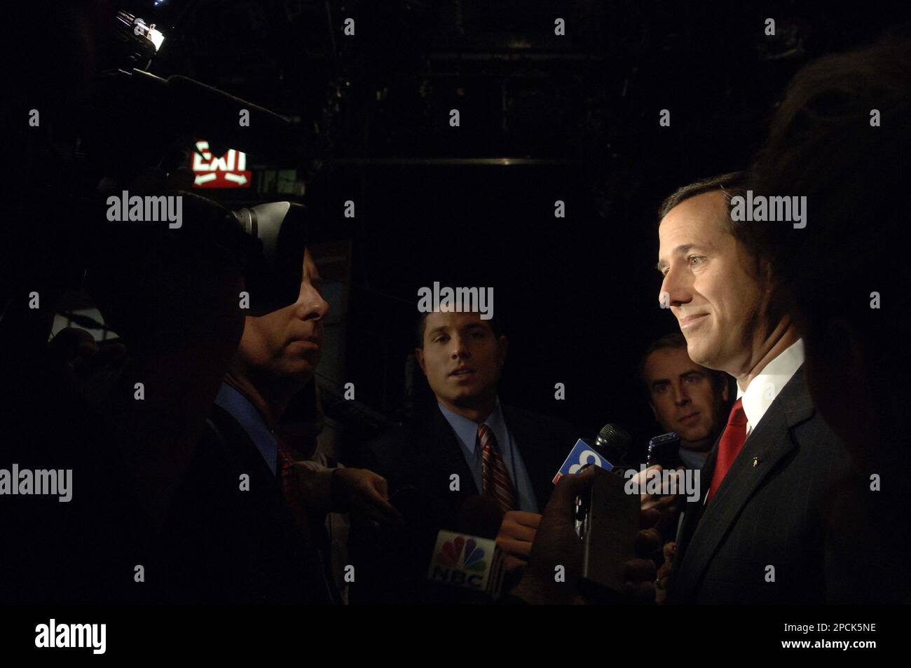 Sen. Rick Santorum, R-Pa., talks with the media after his debate with ...