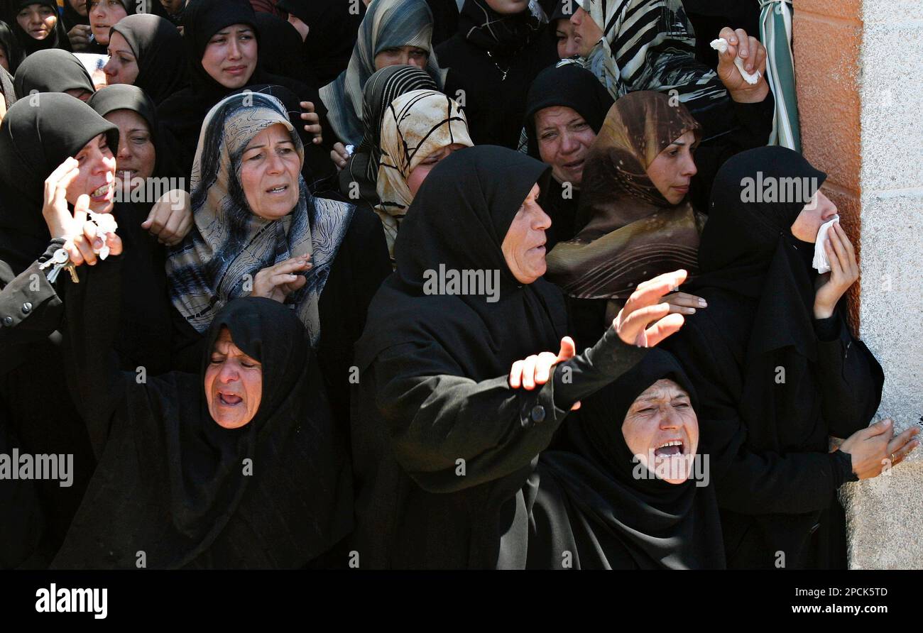 Lebanese women mourn during the funeral procession of Hezbollah ...