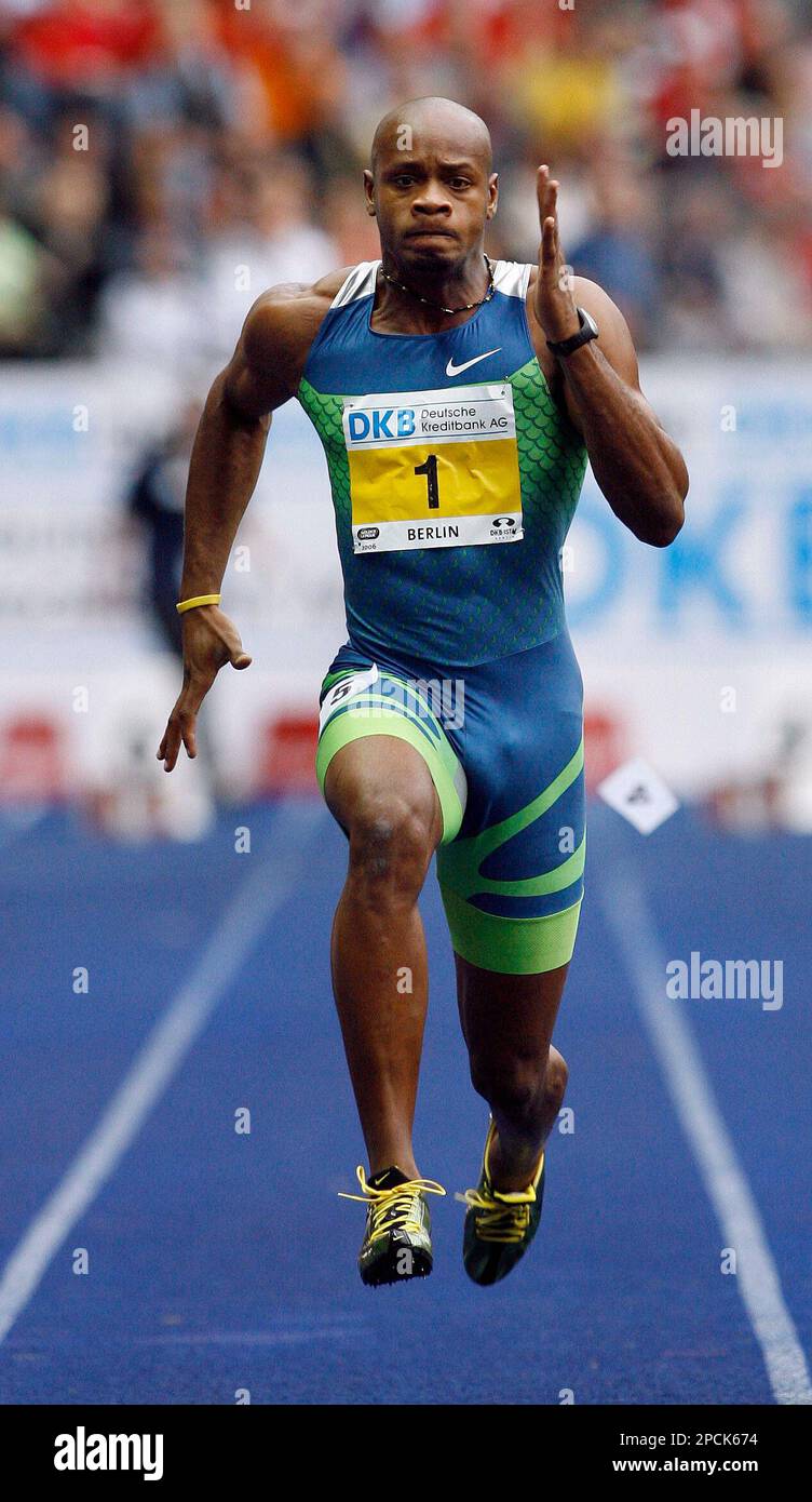 Asafa Powell from Jamaica on his way to win the Men's 100 meters race ...