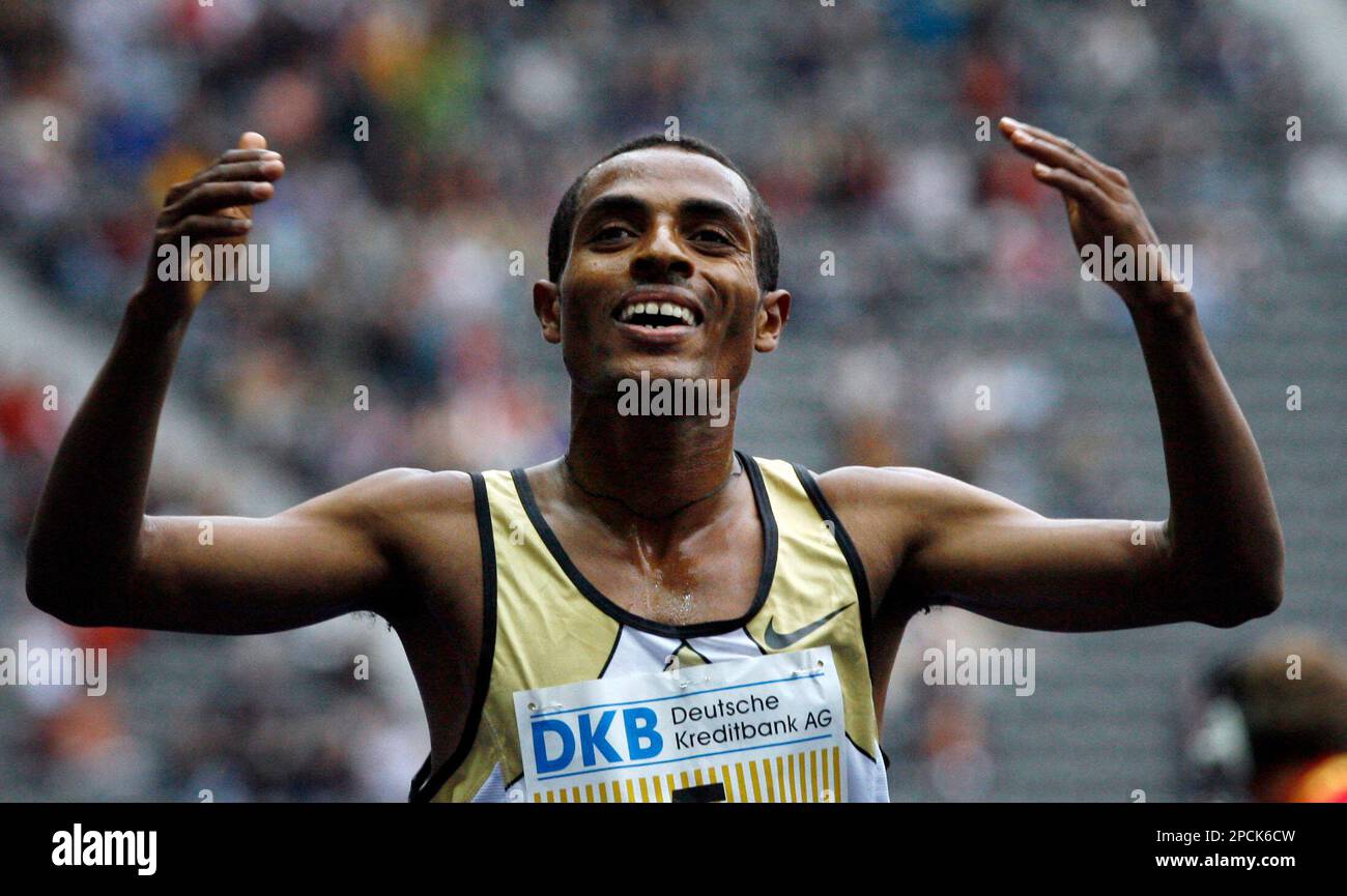 Kenenisa Bekele from Ethopia celebrates after crossing the finish to ...
