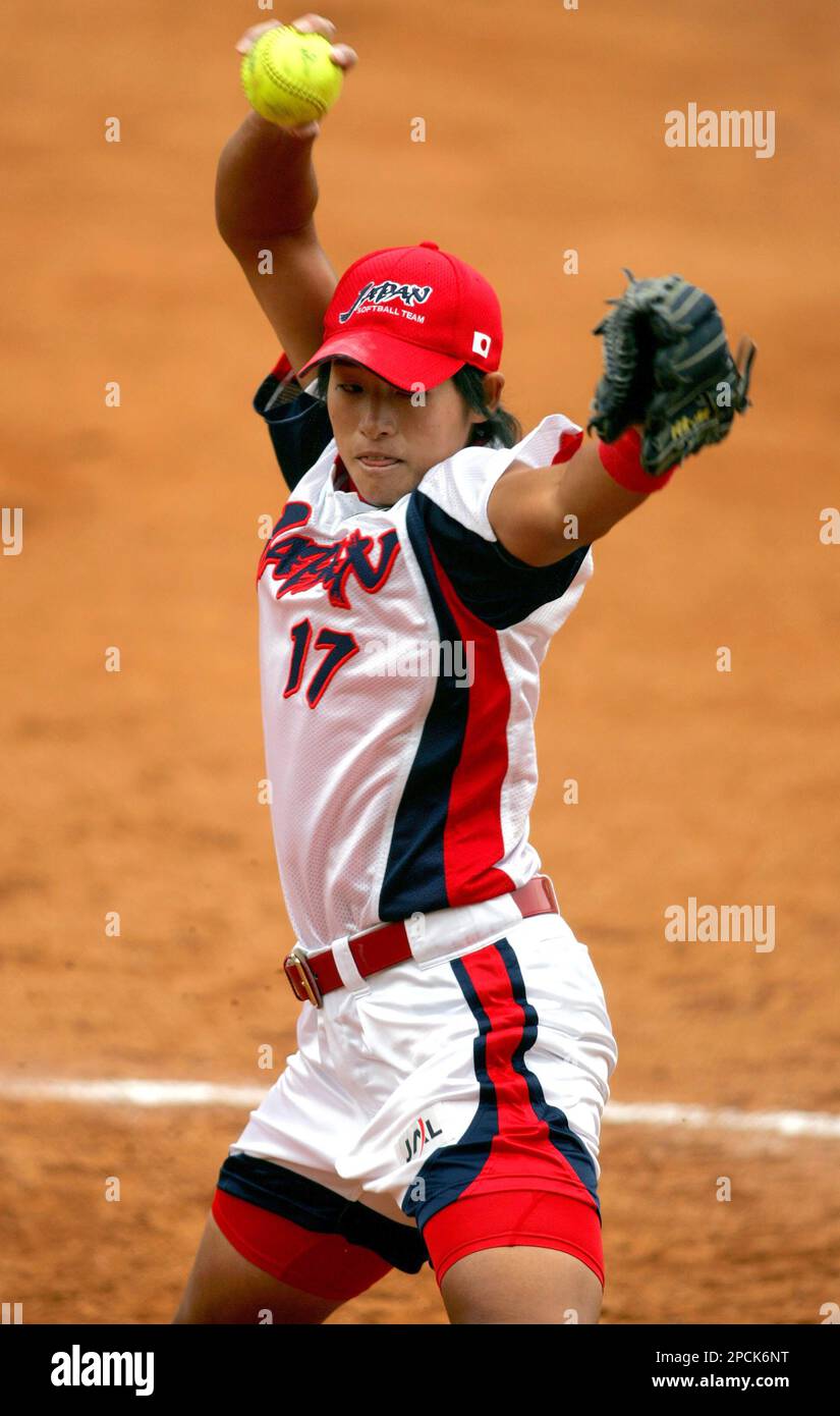 Japan's starter Yukiko Ueno winds up on a pitch against China during ...