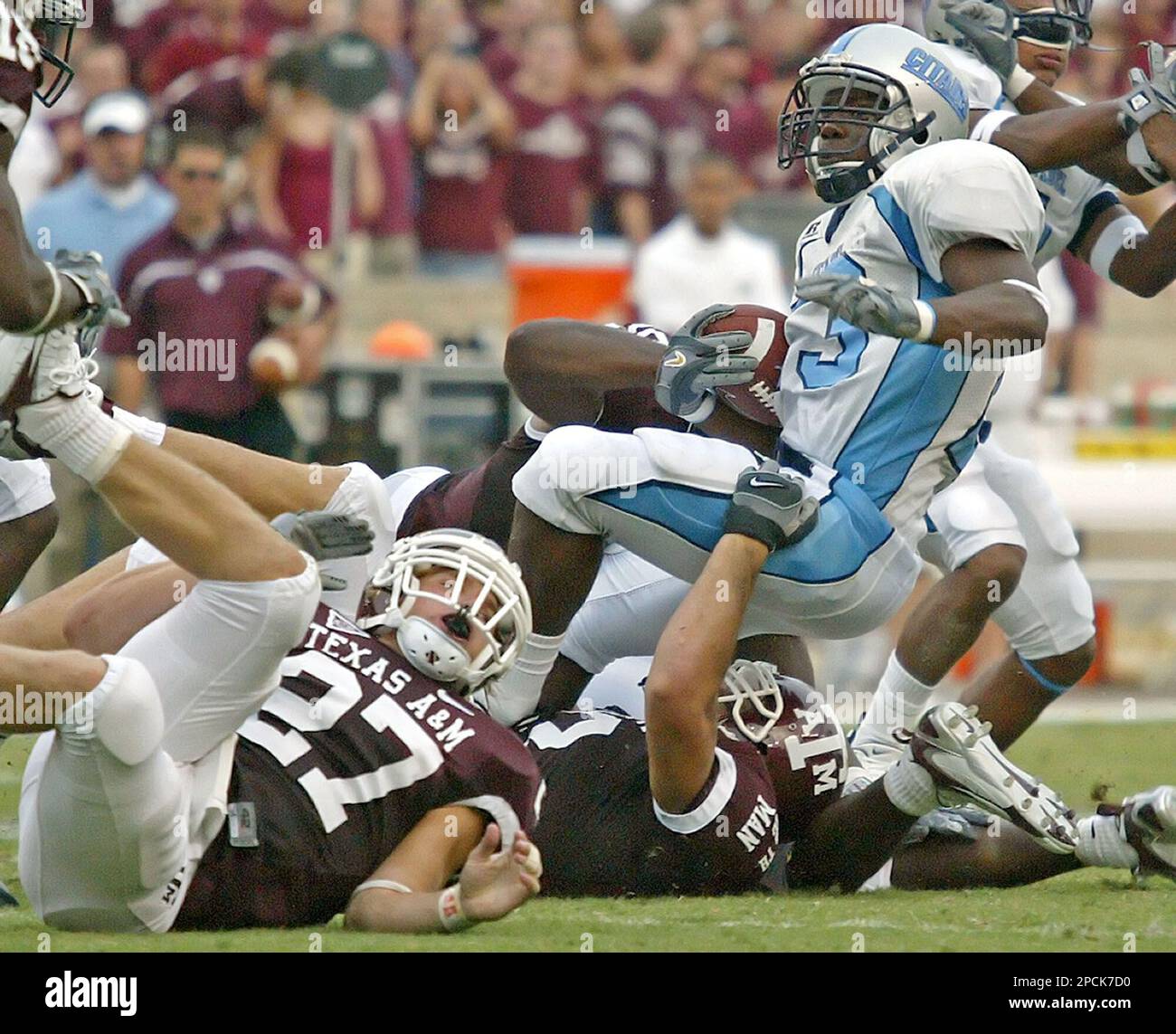 The Citadel's Tory Cooper is brought down by Texas A&M's Nick LaMantia ...