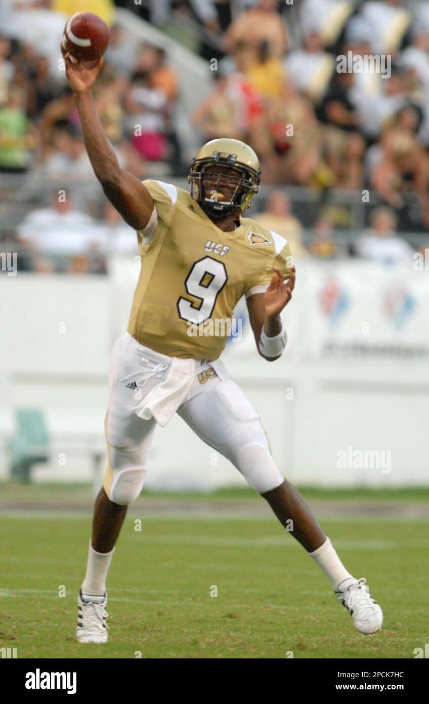 Central Florida quarterback Steven Moffett throws a 13-yard touchdown ...