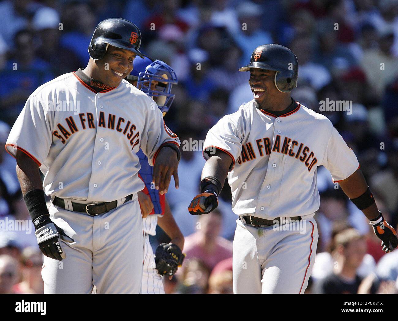 San Francisco Giants' Ray Durham, right, smiles as he celebrates with ...