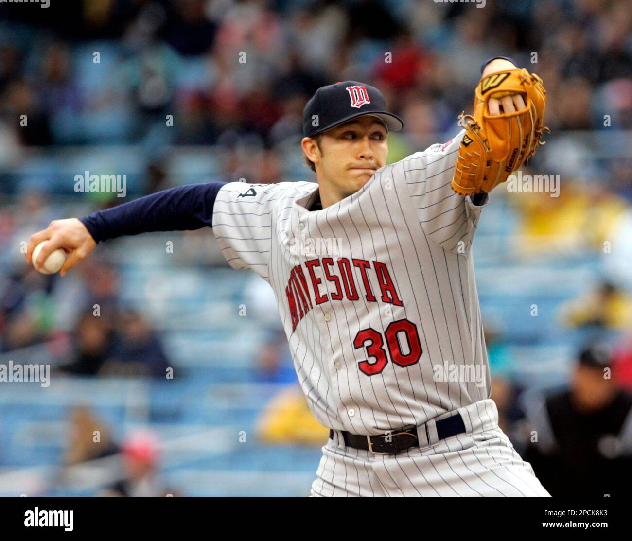 Minnesota Twins pitcher Scott Baker delivers a pitch during the first ...