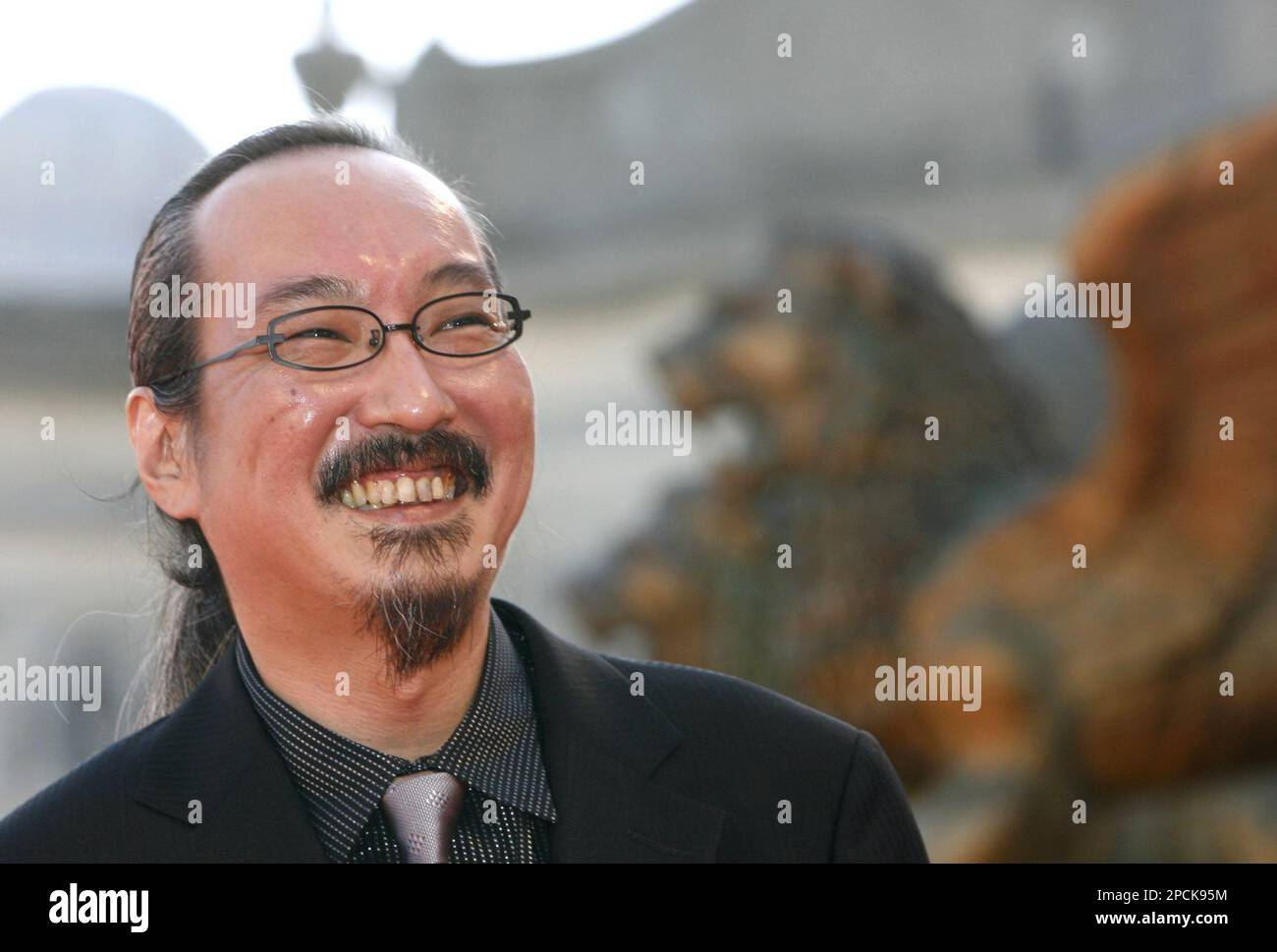 Japanese director Kon Satoshi smiles prior to the screening of his ...