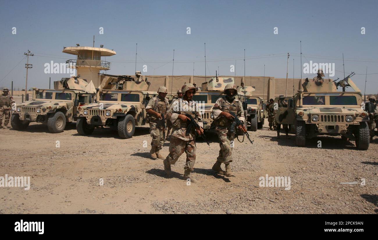 Iraqi army soldiers arrive to take charge of the Abu Ghraib prison from ...