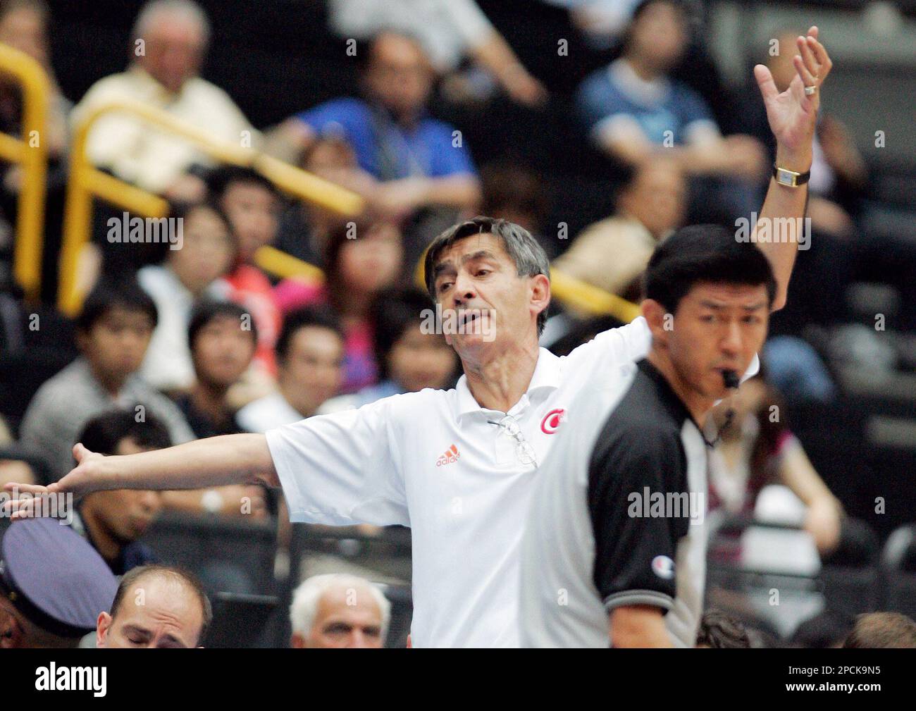 Turkey head coach Bogdan Tanjevic reacts as a referee looks on during ...