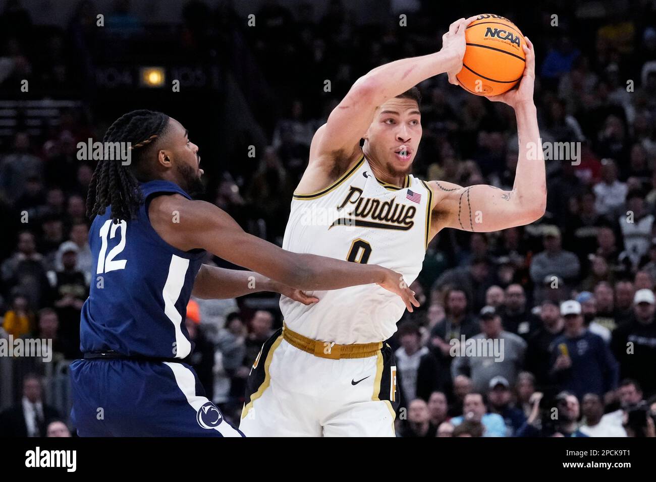Purdue forward Mason Gillis, right, looks to pass as Penn State guard ...