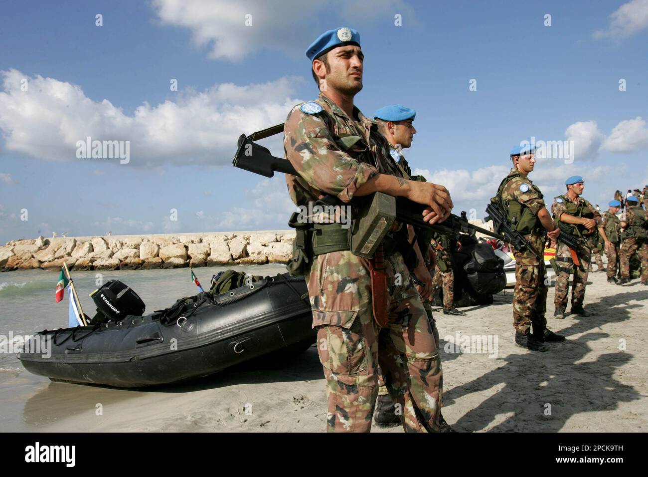 Italian U.N soldier from UNIFIL guard the beach, Saturday, Sept. 2 ...