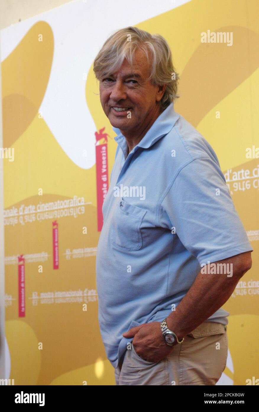 Dutch director Paul Verhoeven smiles with photographers after the news ...