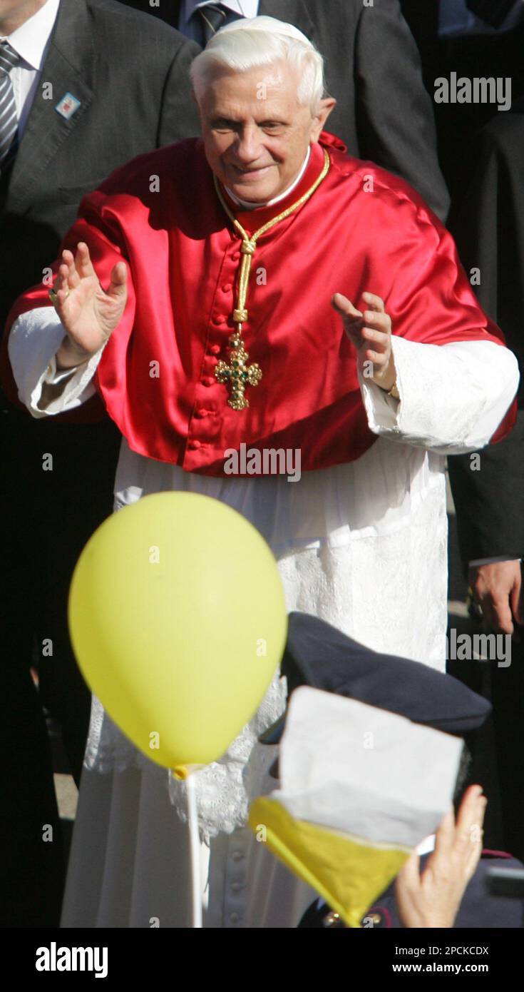 Pope Benedict XVI greets the faithful during his visit at the "Holy ...