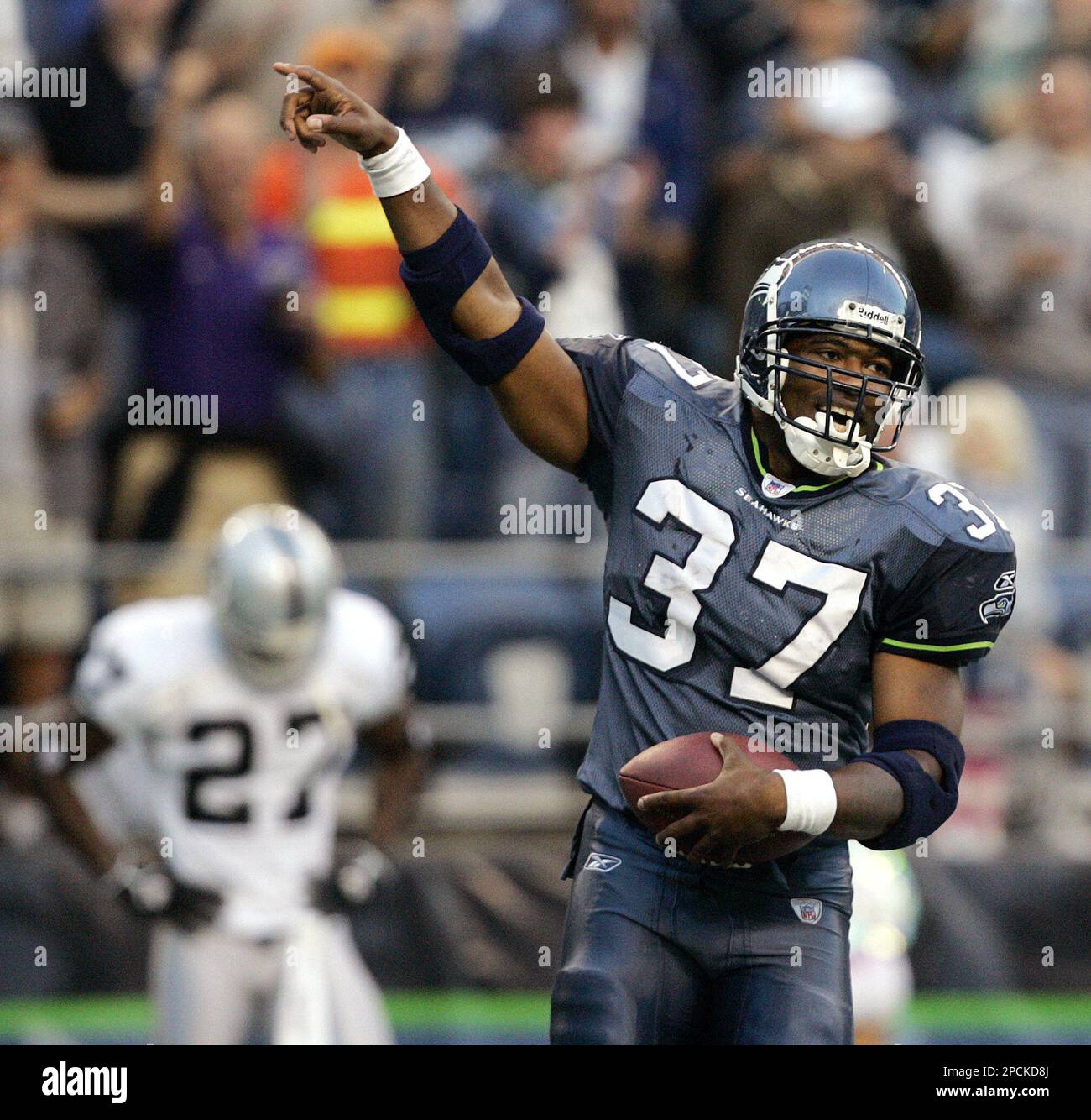 Seattle Seahawks' Shaun Alexander (37) celebrates his first-quarter ...