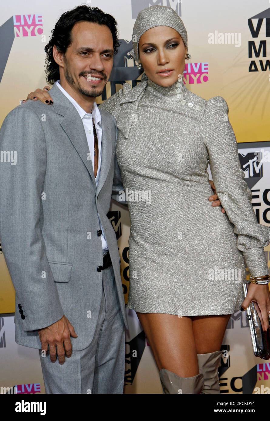 Marc Anthony, left, and his wife Jennifer Lopez arrive at the 2006 MTV ...