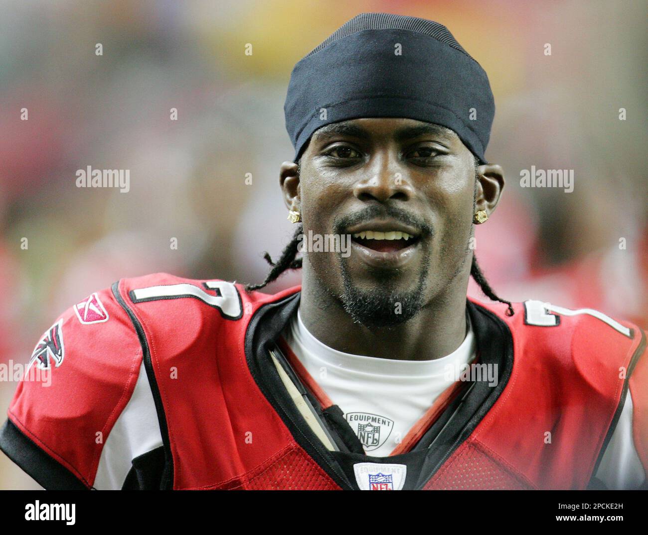 Atlanta Falcons quarterback Michael Vick (7) watches from the sidelines ...